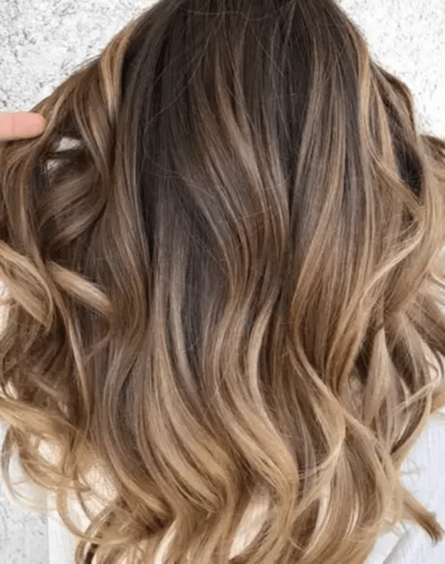 Ombré hair châtain clair : inspirations et conseils pour l'adopter